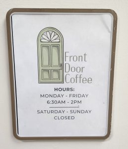 Chamber ties Ribbon on Front Door Coffee - WNEG